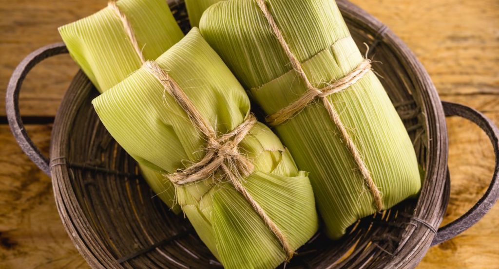 Qual é a origem da pamonha? Conheça sua história e receita